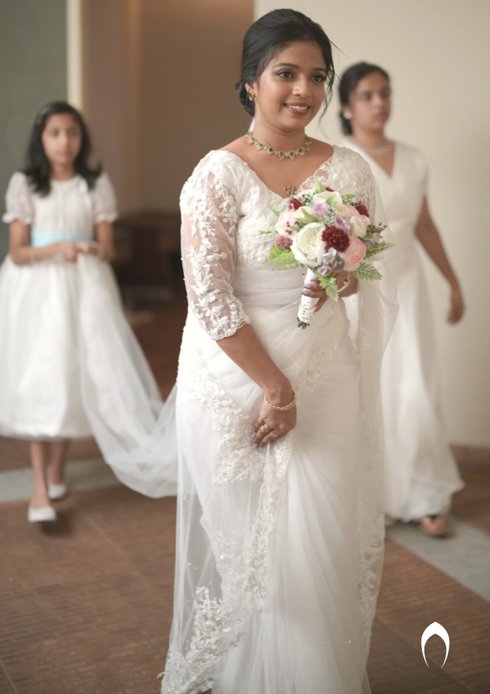 Signature Christian white bridal saree with embellished lace embroider ...